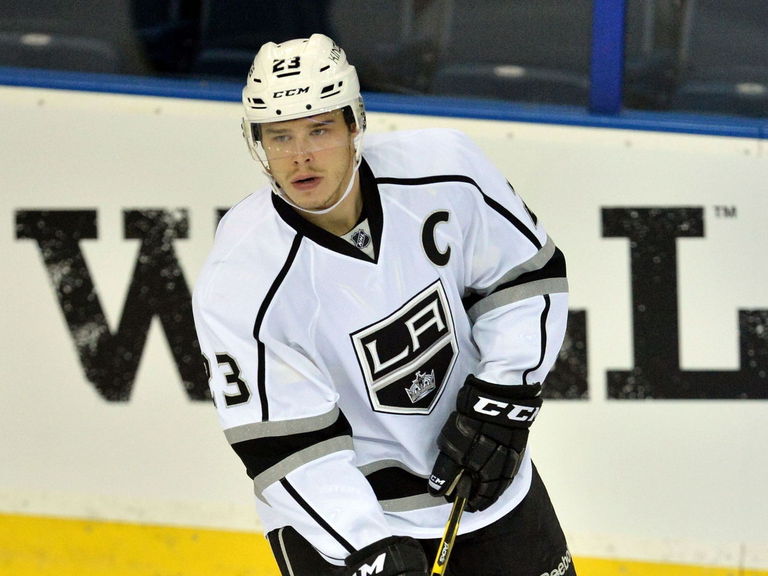 GIF: Kings' Brown crushes Ducks' Perry in open ice | theScore.com