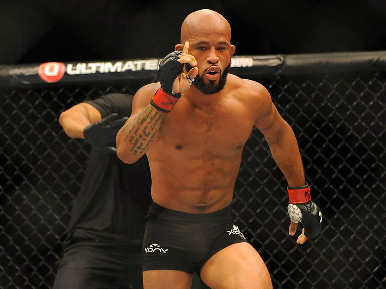 Johnson retains title at UFC 191 with dominant victory over Dodson ...
