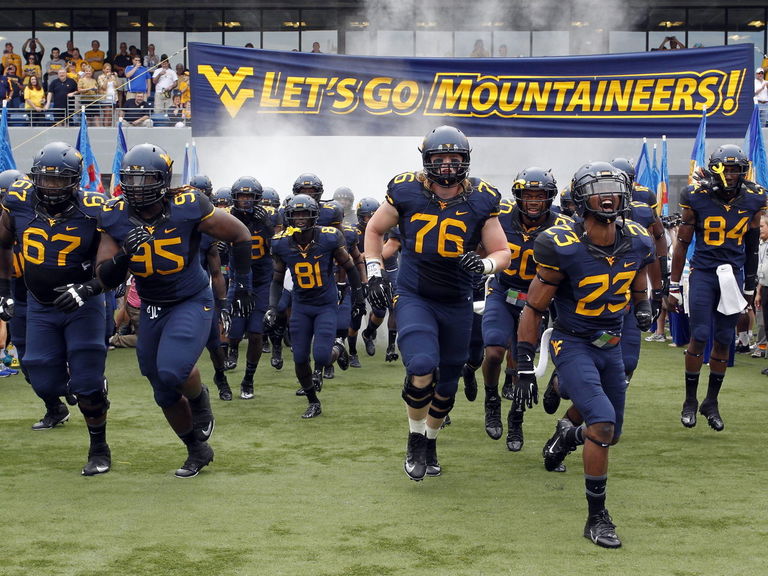 VIDEO: West Virginia's locker room erupts into WWE-inspired brawl ...