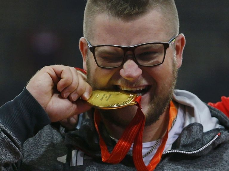 Polish hammer-throw champion drunkenly uses gold medal to pay for taxi ...