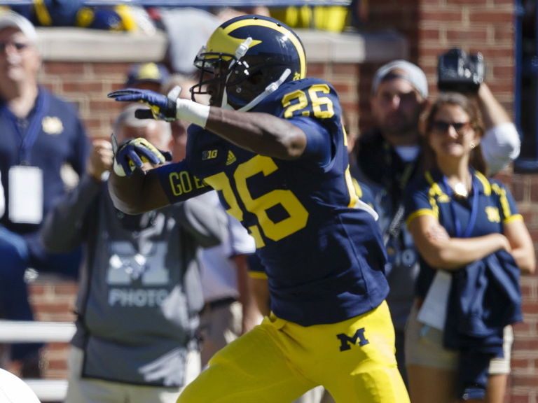 Michigan's Lewis: 'I got hit by a nose tackle that can kick' | theScore.com