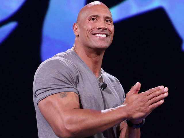 The Rock recalls how high school football coach helped chan…