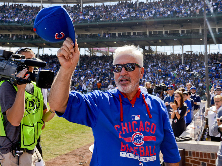 PHOTO: Cubs manager Joe Maddon drives a 1976 Dodge van | theScore.com