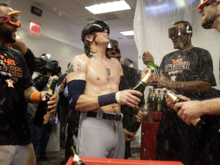 PHOTO: Shirtless Colby Rasmus leads postgame celebration | theScore.com