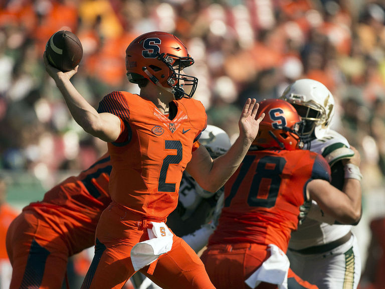 VIDEO: Syracuse QB Eric Dungey leaps defender, gets leveled | theScore.com
