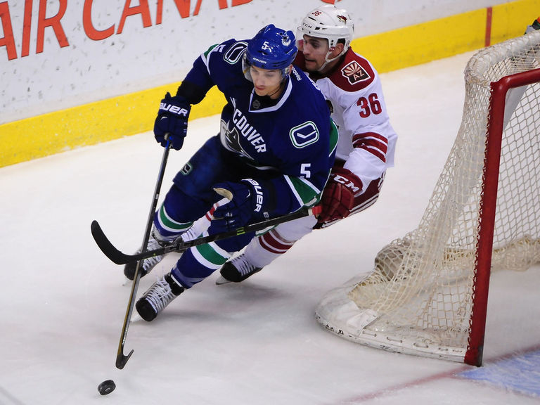 Canucks' Sbisa day to day with hand injury | theScore.com