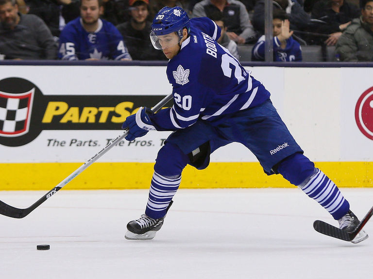 PHOTO: David Booth appears on his way to KHL | theScore.com