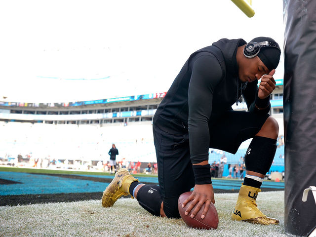 PHOTO: Cam Newton warming up in custom Heisman cleats | th…