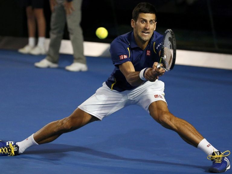 VIDEO: Djokovic slides into brilliant, split-legged backhand pass ...