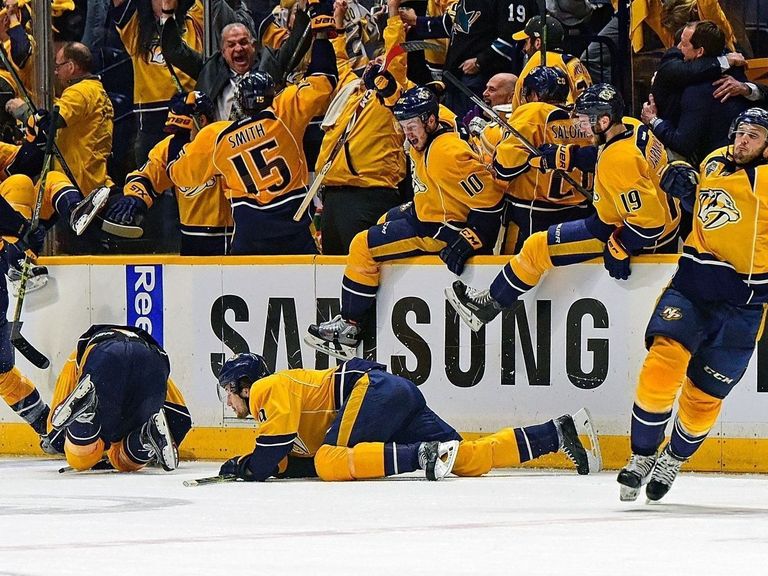 Watch: Predators tumble onto ice celebrating triple-OT winner ...