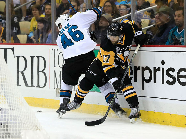 Penguins' Rust day to day after 'blindside hit to the head' | theScore.com