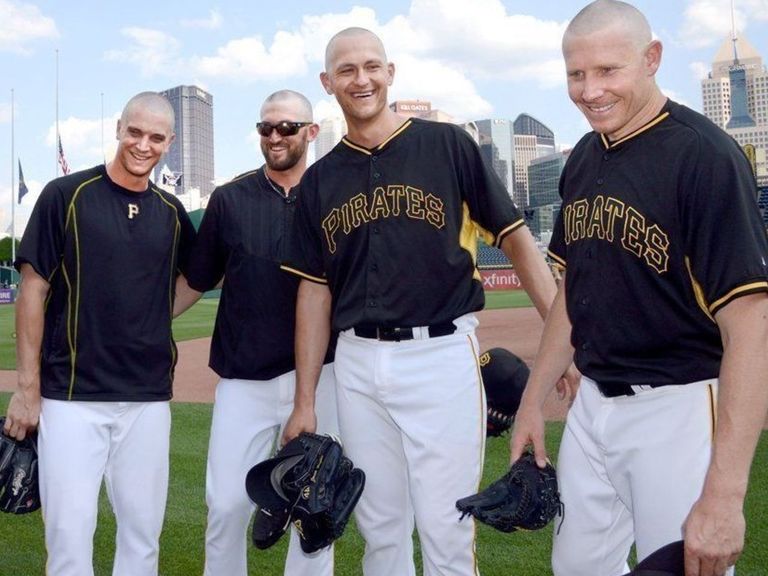 Pirates bullpen shaves heads in show of unity | theScore.com