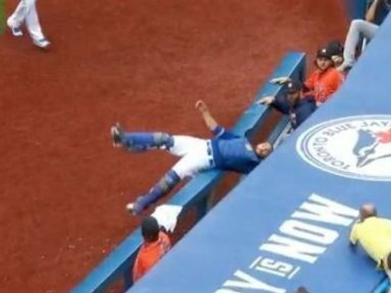 Martin stretches and rolls on dugout railing for ridiculous grab ...