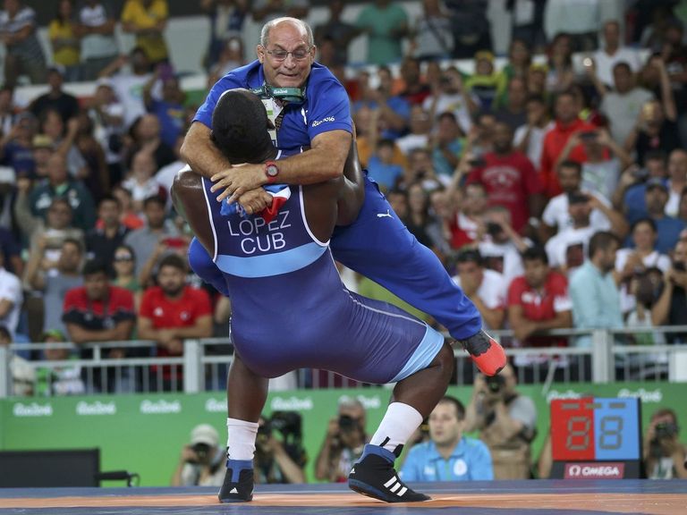 Look: Cuban wrestler bodyslams elderly coach after winning gold ...