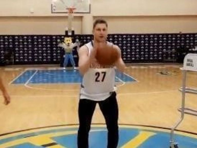MacKinnon drills backwards half-court shot at Nuggets practice ...