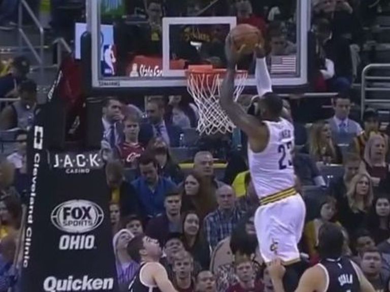 LeBron shakes rim with vicious slam | theScore.com