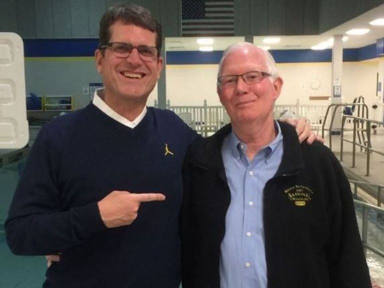 Harbaugh drinks milk with mailman who ran him over 45 years earlier ...