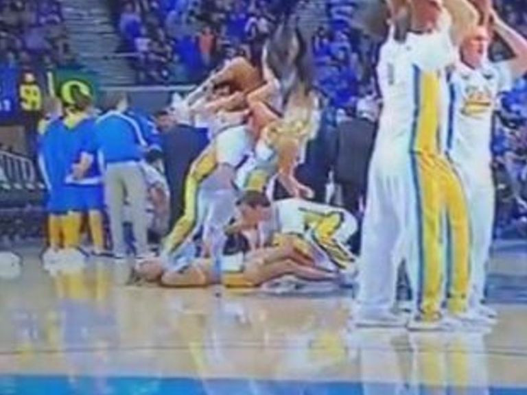 UCLA cheerleaders take multiple spills during timeout | theScore.com