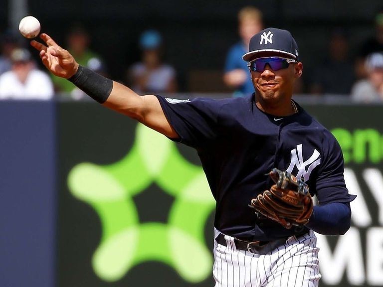Yankees reassign top prospect Torres to minors after red-hot spring ...