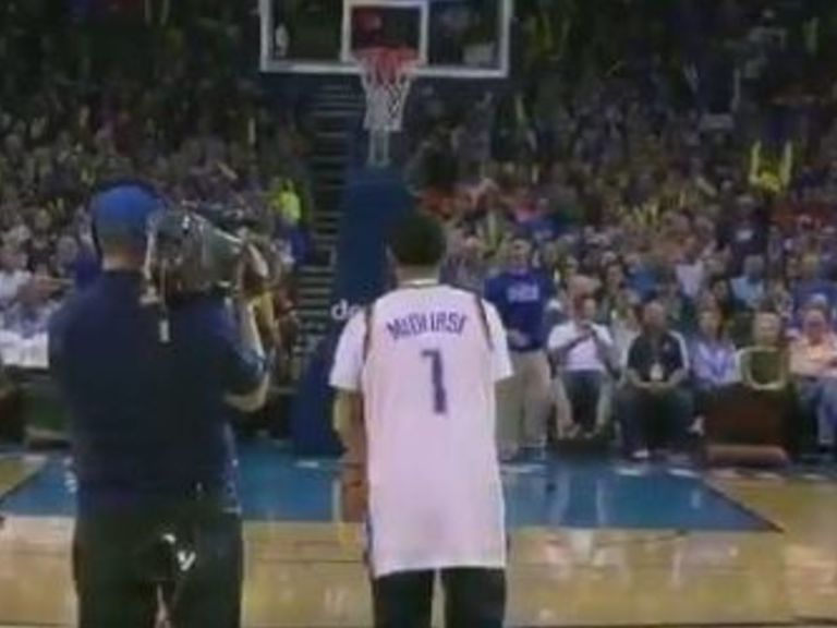 Watch: Thunder fan hits half-court shot to win $20K | theScore.com