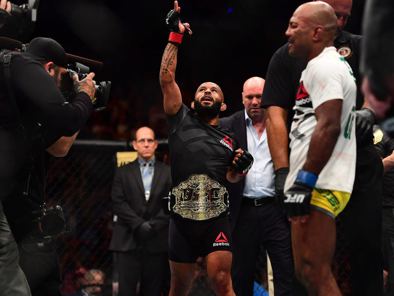 Look: Demetrious Johnson finally gets all 10 UFC belts | theScore.com
