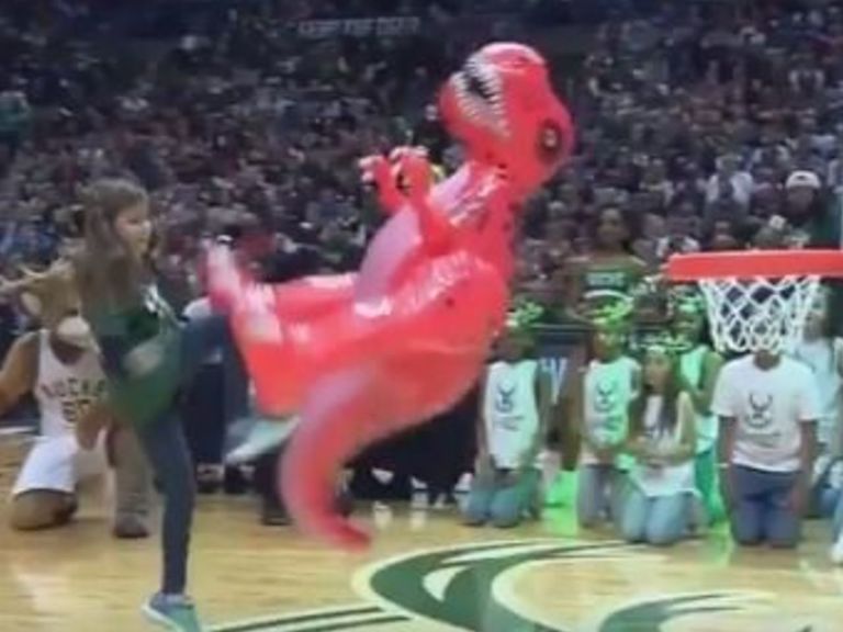 Watch: Bucks fan kicks inflatable Raptor during kids dunk contest ...