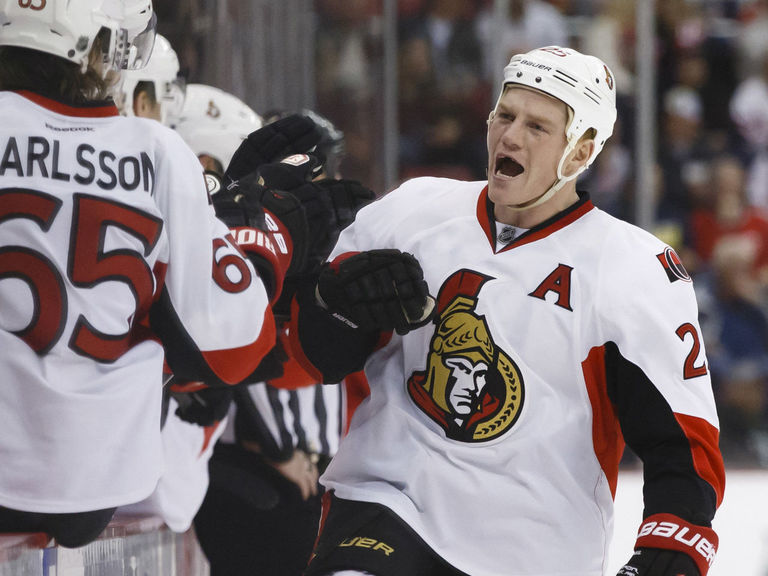 Teammates congratulate Chris Neil on reaching 1,000 NHL games ...