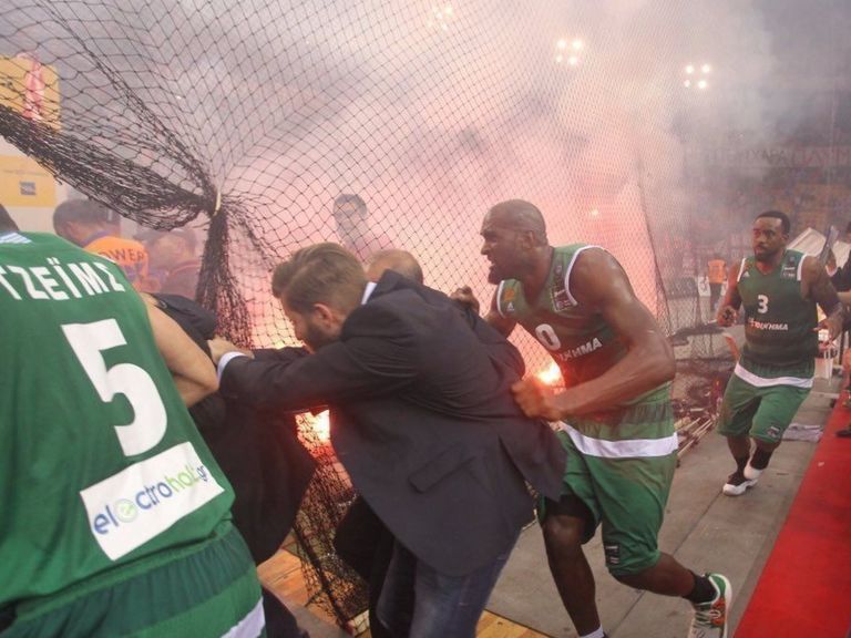 Watch: Fans toss flares during Greek basketball league title game ...