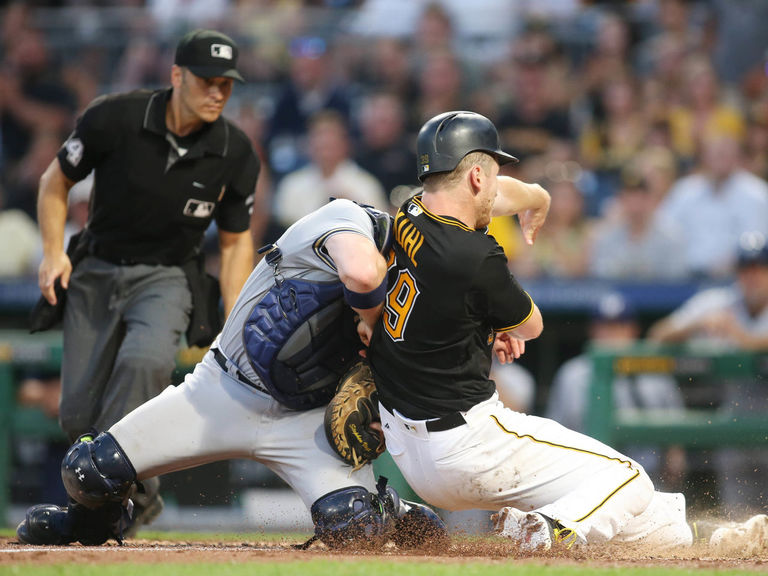 Watch: Vogt leaves game after brutal home-plate collision | theScore.com