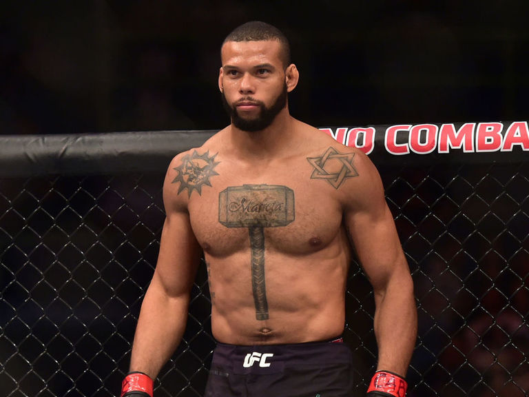 Santos wilts Smith with liver kick, punches for 2nd-round TKO ...