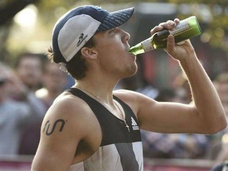 Watch: Canadian runner breaks beer mile world record | theScore.com