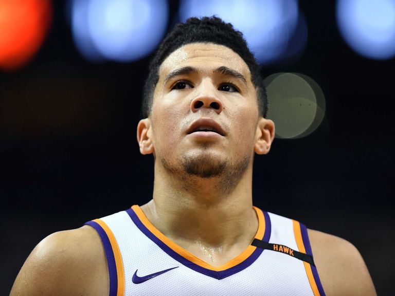 Booker joins exclusive company as 4th youngest to reach 3,000 points ...