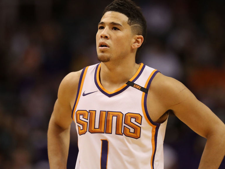 Devin Booker carried off floor after suffering adductor strain ...