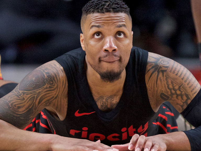 Lillard returns day after son is born, half-brother is shot | theScore.com
