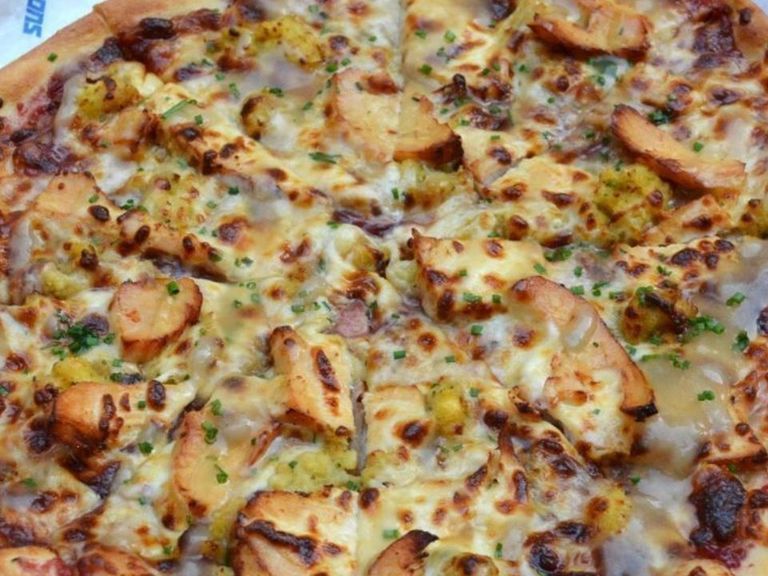 A collection of images of the Lions' Thanksgiving Day pizza | theScore.com
