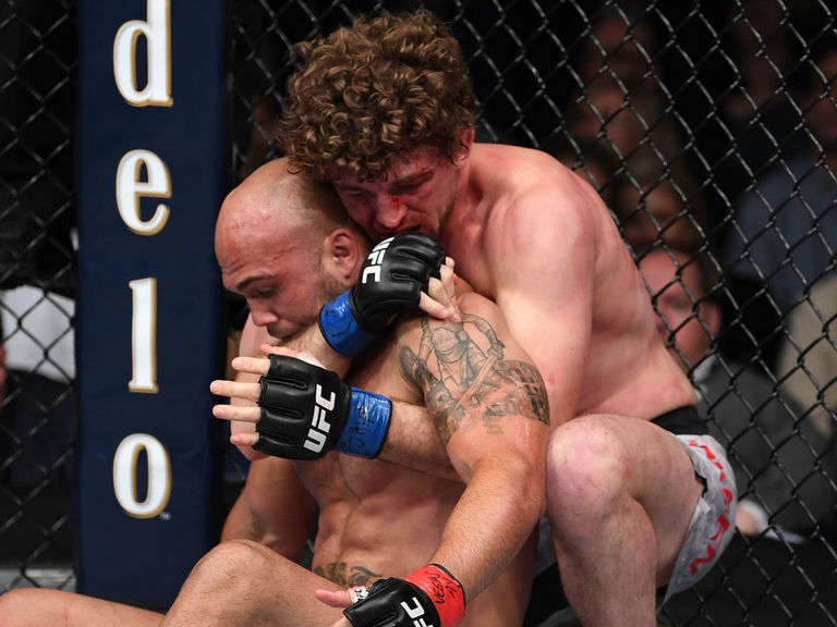 Askren overcomes vicious body slam, submits Lawler to win UFC debut ...