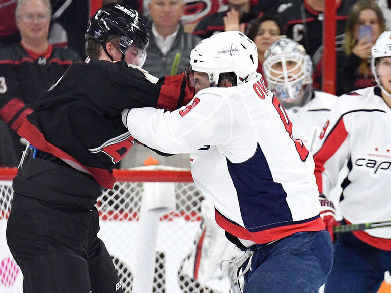 Watch: Ovechkin knocks Svechnikov to ice in ruthless fight | theScore.com