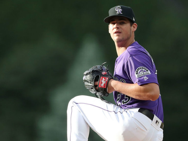Lambert bottles up Cubs again as Rockies win 10th straight at home ...