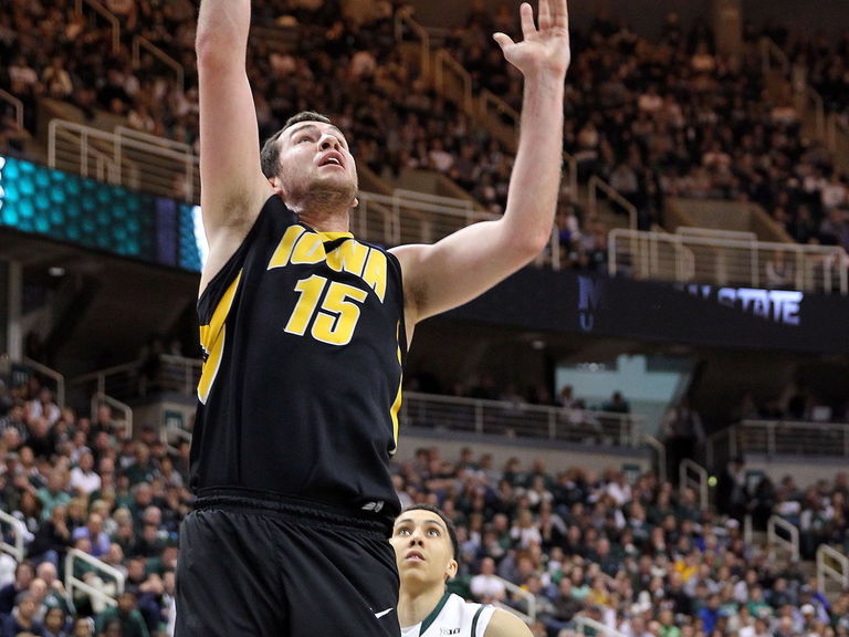 GIF: Iowa F McCabe takes down Michigan St. G Trice with wrestling move ...