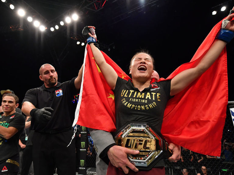 Zhang TKOs Andrade in 42 seconds, becomes 1st Chinese champ in UFC ...
