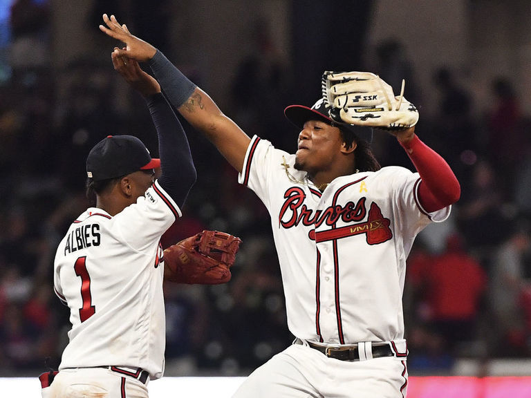 Braves clinch postseason berth with rout of Nats | theScore.com