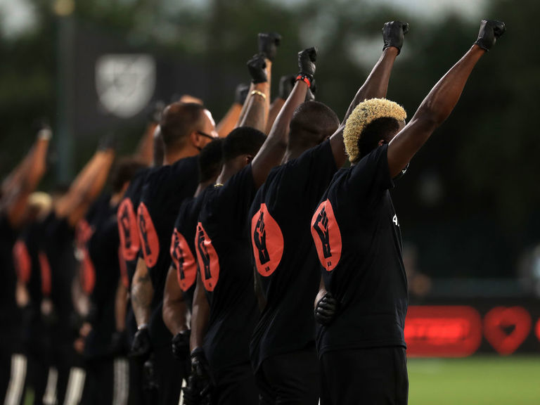 Watch: MLS players unite in BLM tribute ahead of 1st match | theScore.com