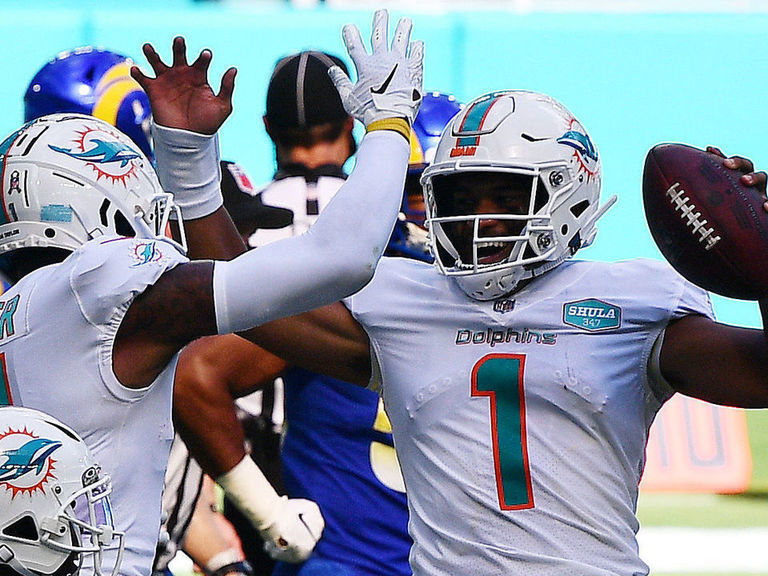 Tua throws TD in 1st career start, Dolphins roll past Rams | theScore.com