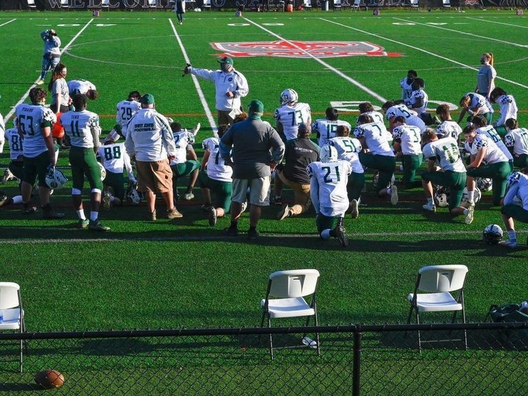 HS football coach suffers heart attack at halftime, continues coaching ...