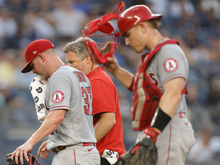 Angels' Bundy vomits on field, removed due to heat exhaustion ...