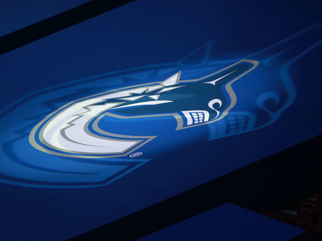 Canucks hire Flames pro scout Derek Clancey as assistant GM…
