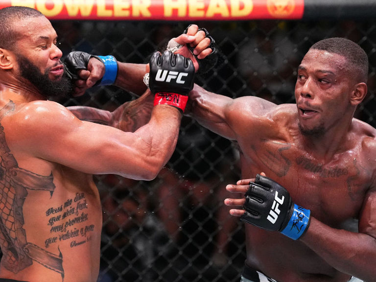 Hill guts out TKO win over Santos in back-and-forth UFC main event ...