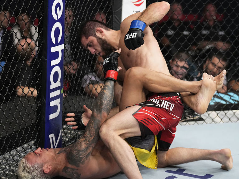 Makhachev submits Oliveira in 2nd round to win title in UFC 280 main ...