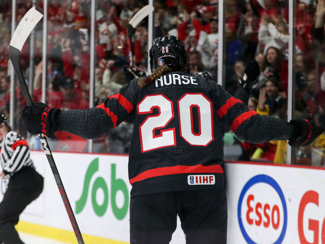 Canada avoids quarterfinal scare with OT win over Sweden