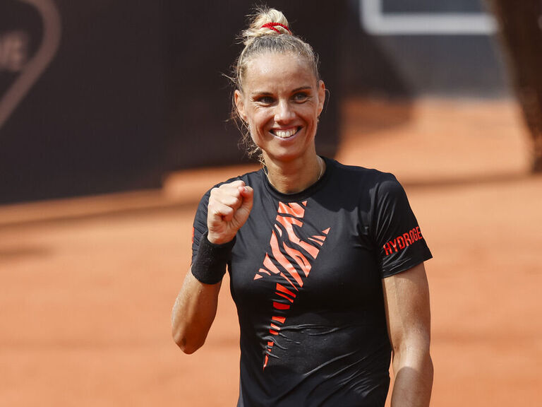 Rus, 32, wins first WTA title after beating German teenager in Hamburg ...